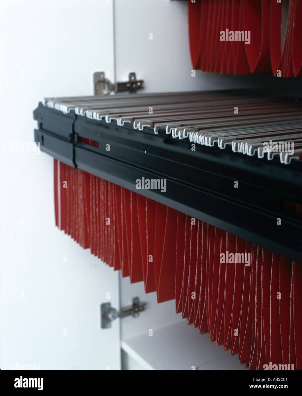 Red hanging files Stock Photo - Alamy