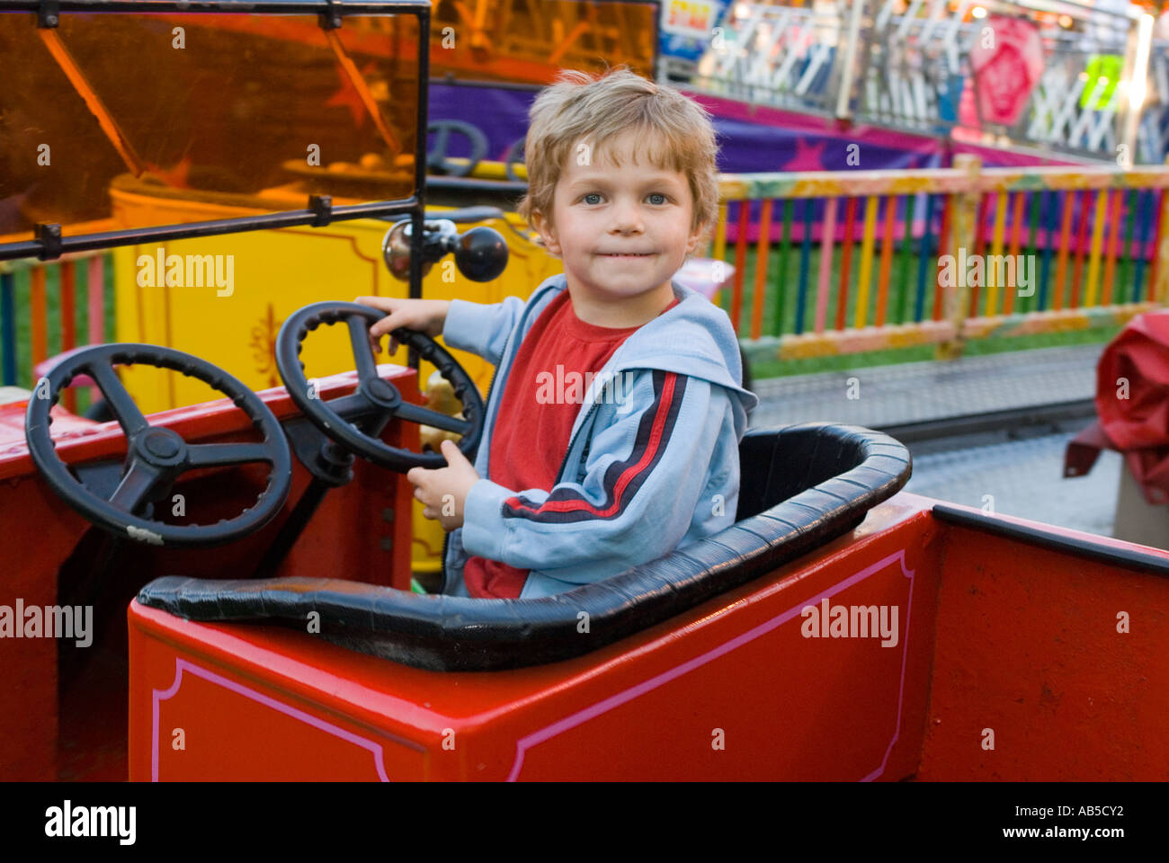 Boy child kid ride fair car hi-res stock photography and images - Alamy