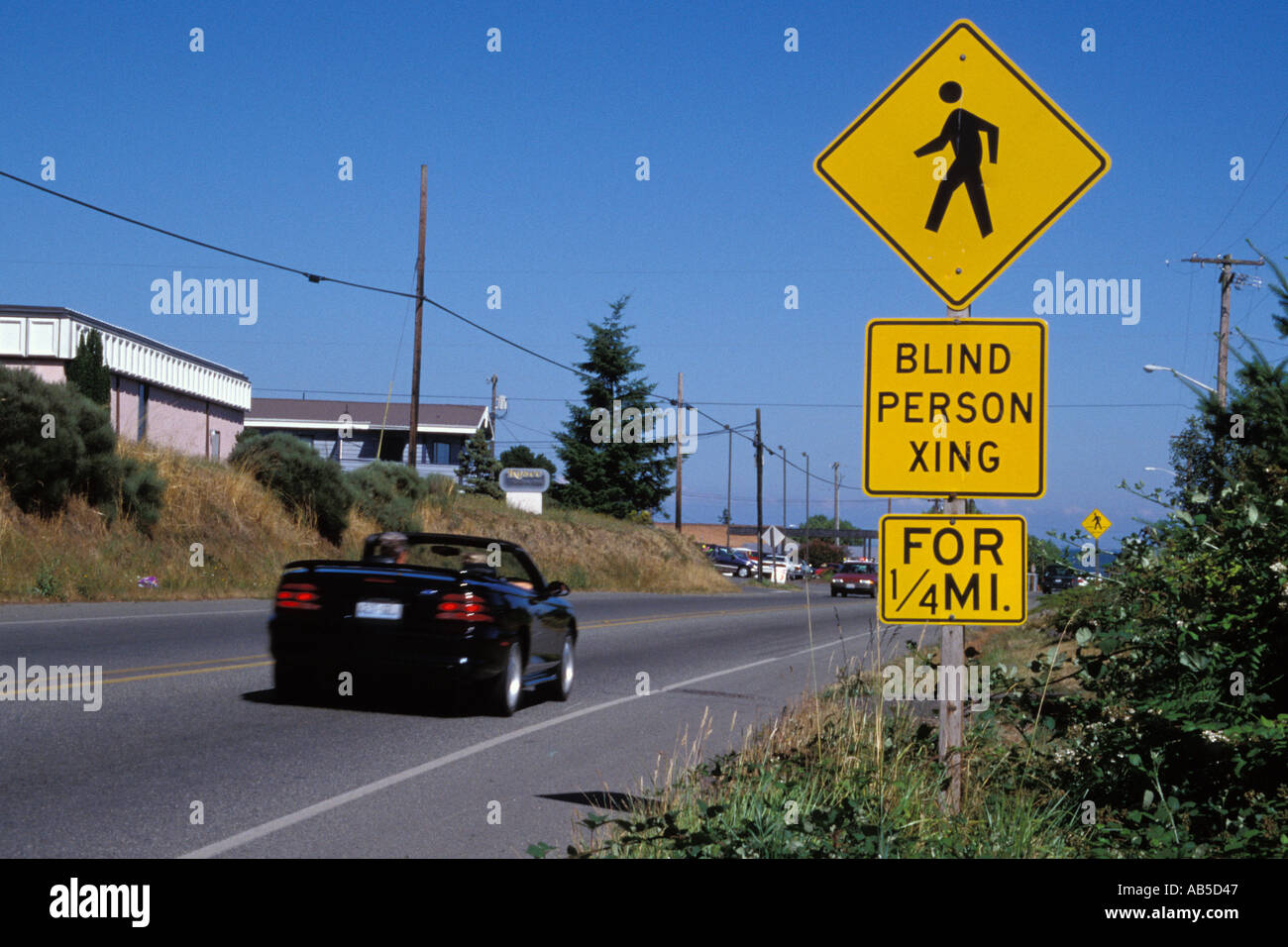 Car passes Blind Person Crossing warning road sign Poulsbo Washington ...