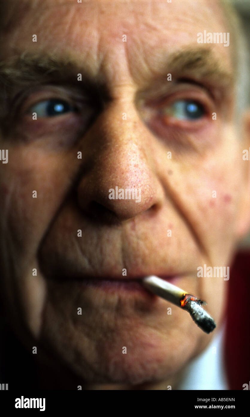 Old aged pensioner smoking a hand rolled cigarette, UK Stock Photo - Alamy
