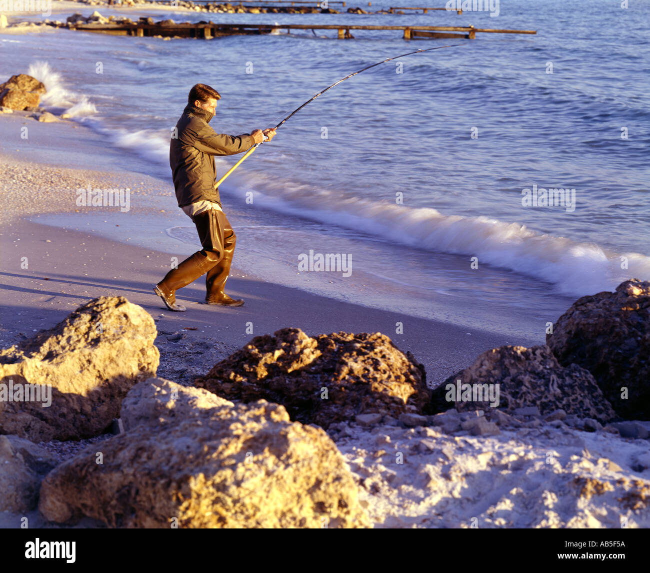 Surfcasting beach fishing hi-res stock photography and images - Alamy