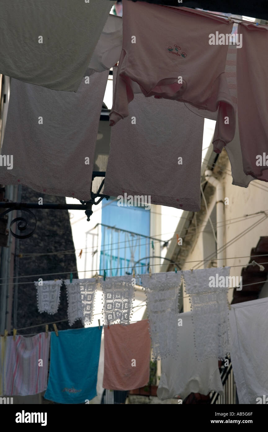 clothing hanging from clothes lines Stock Photo - Alamy