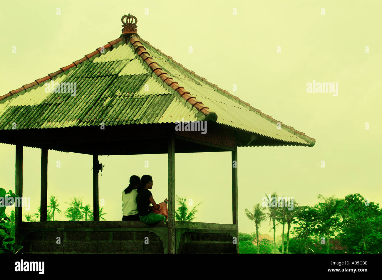 indonesian girls under a hut Stock Photo - Alamy