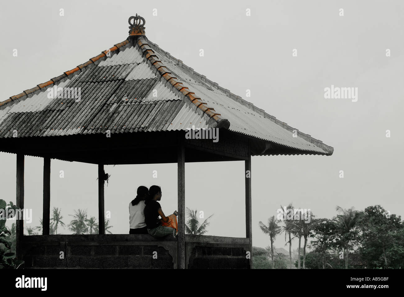 indonesian girls under a hut Stock Photo - Alamy
