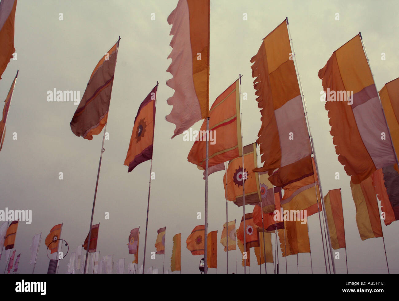 a collection of flags in the dance world area of glastonbury festival ...