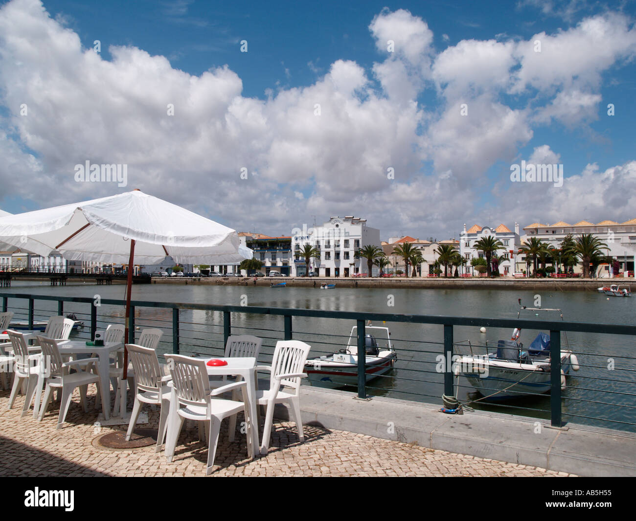 RESTAURANT TABLES by RIO GILAO with with elegant buildings on opposite ...