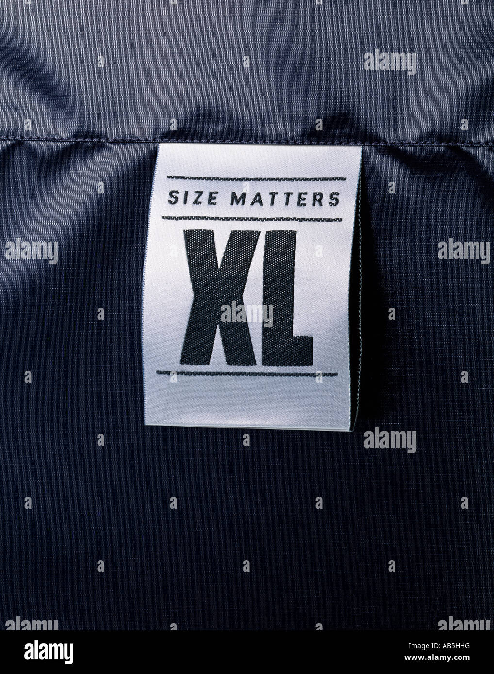 A Clothes label showing size matters Stock Photo - Alamy
