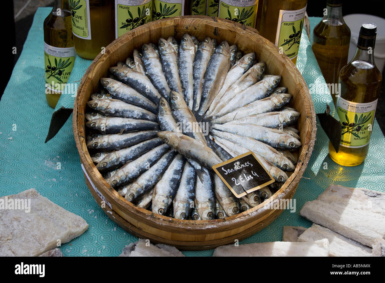 Sardines for sale displayed on a barrel at a fish market in the Herault ...