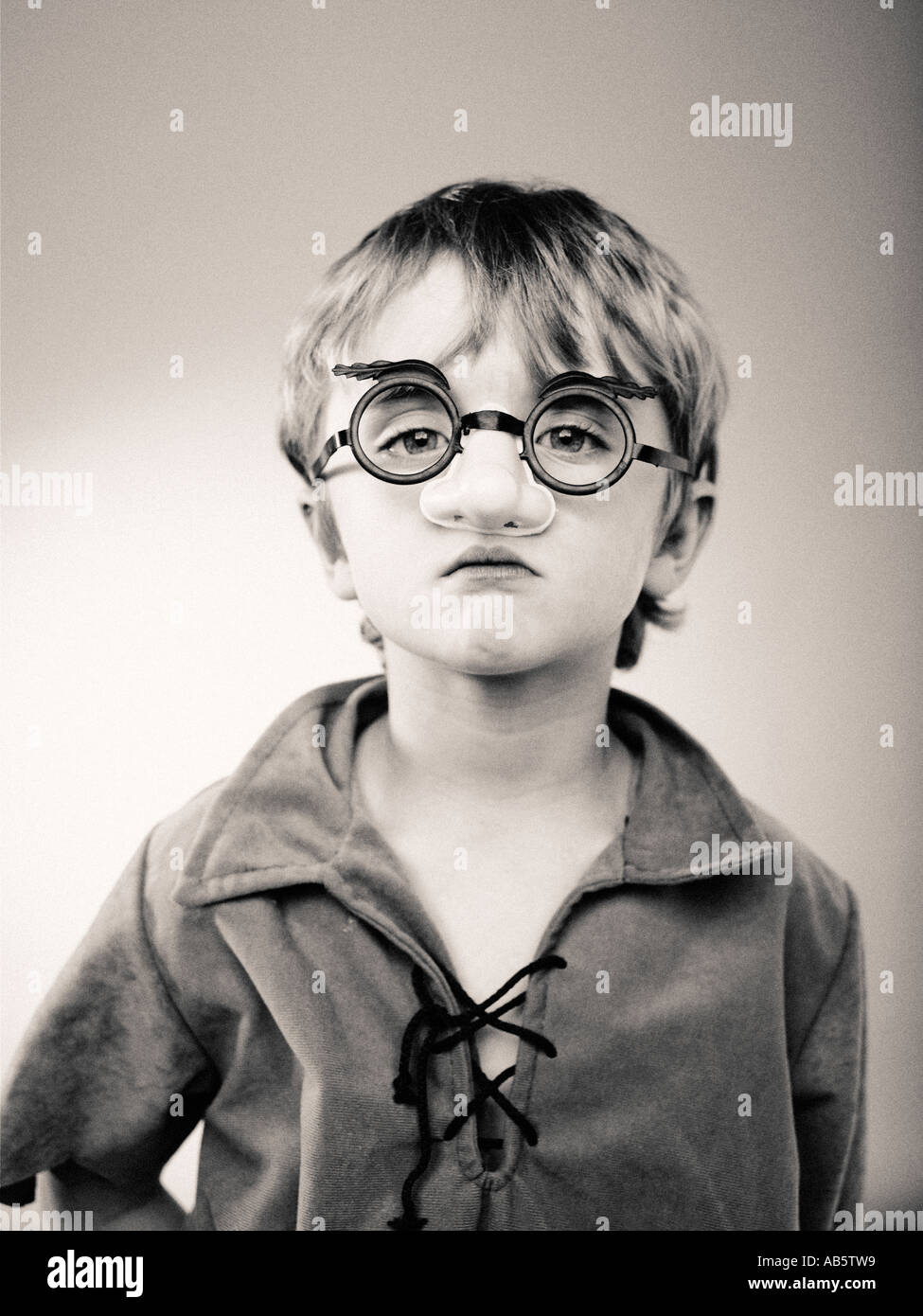 young boy dressed in fake glasses and nose Stock Photo - Alamy