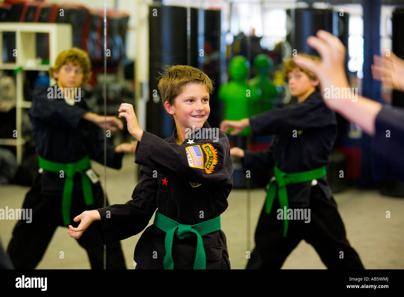 Adolescent boys practice in a martial arts class Stock Photo - Alamy