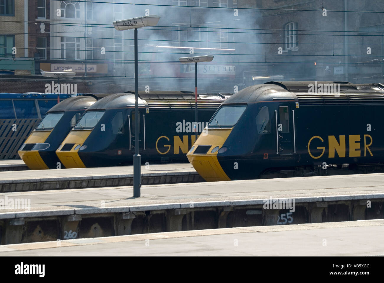 Kings Cross main line rail terminus GNER trains waiting at platforms ...