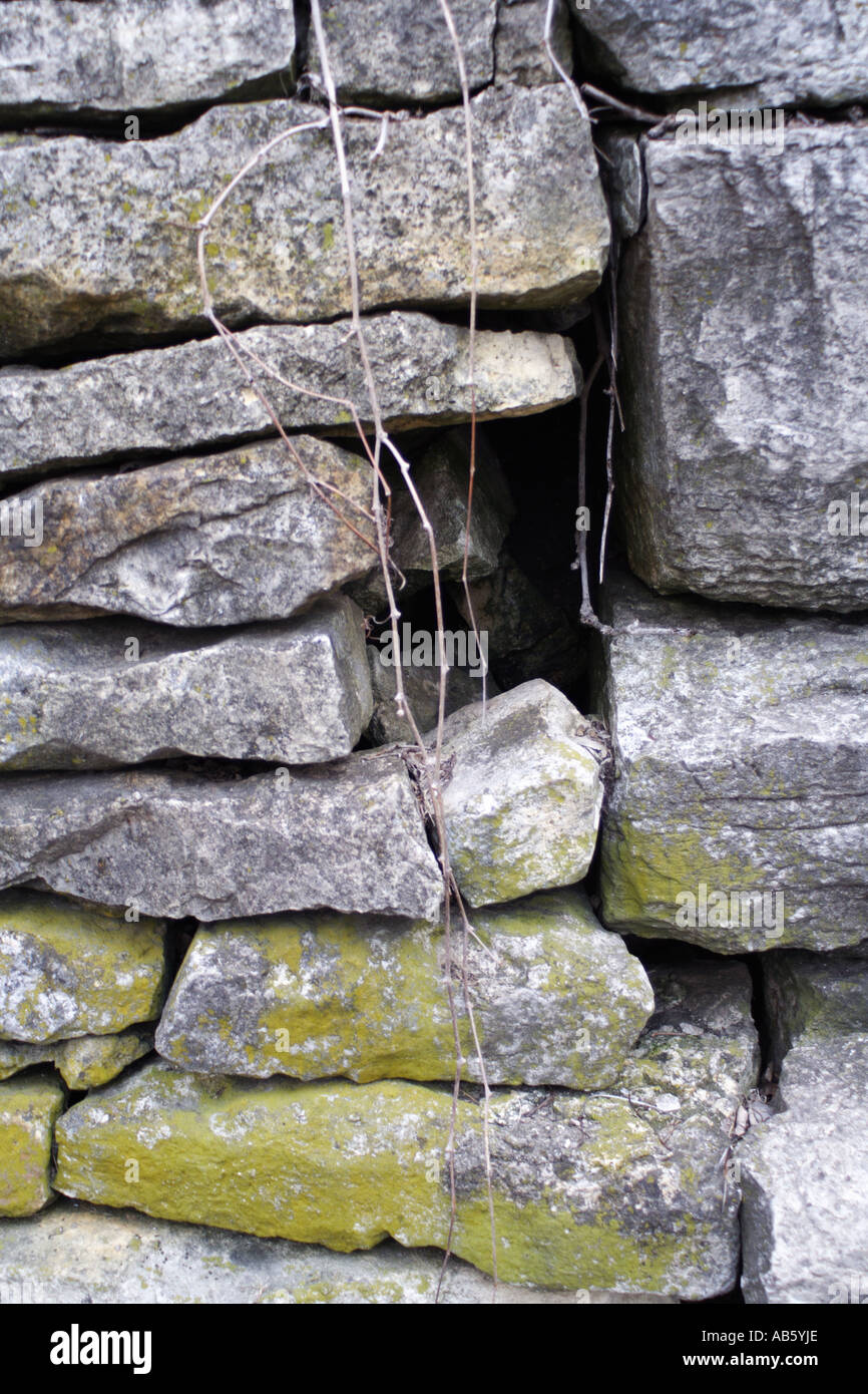 Stone wall with gap Stock Photo - Alamy