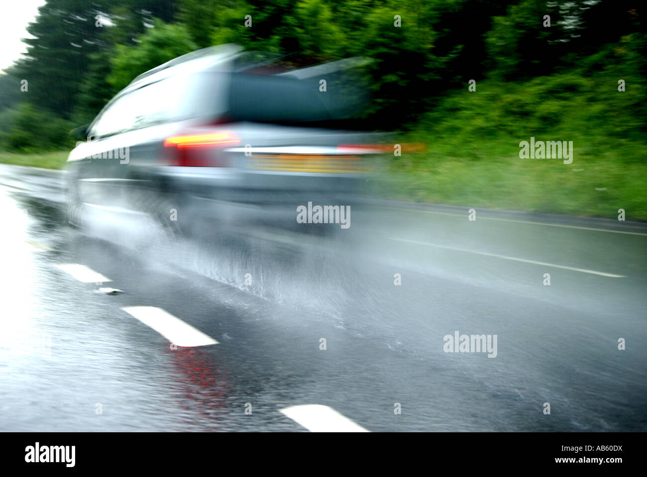 Wet tarmac surface car hi-res stock photography and images - Alamy