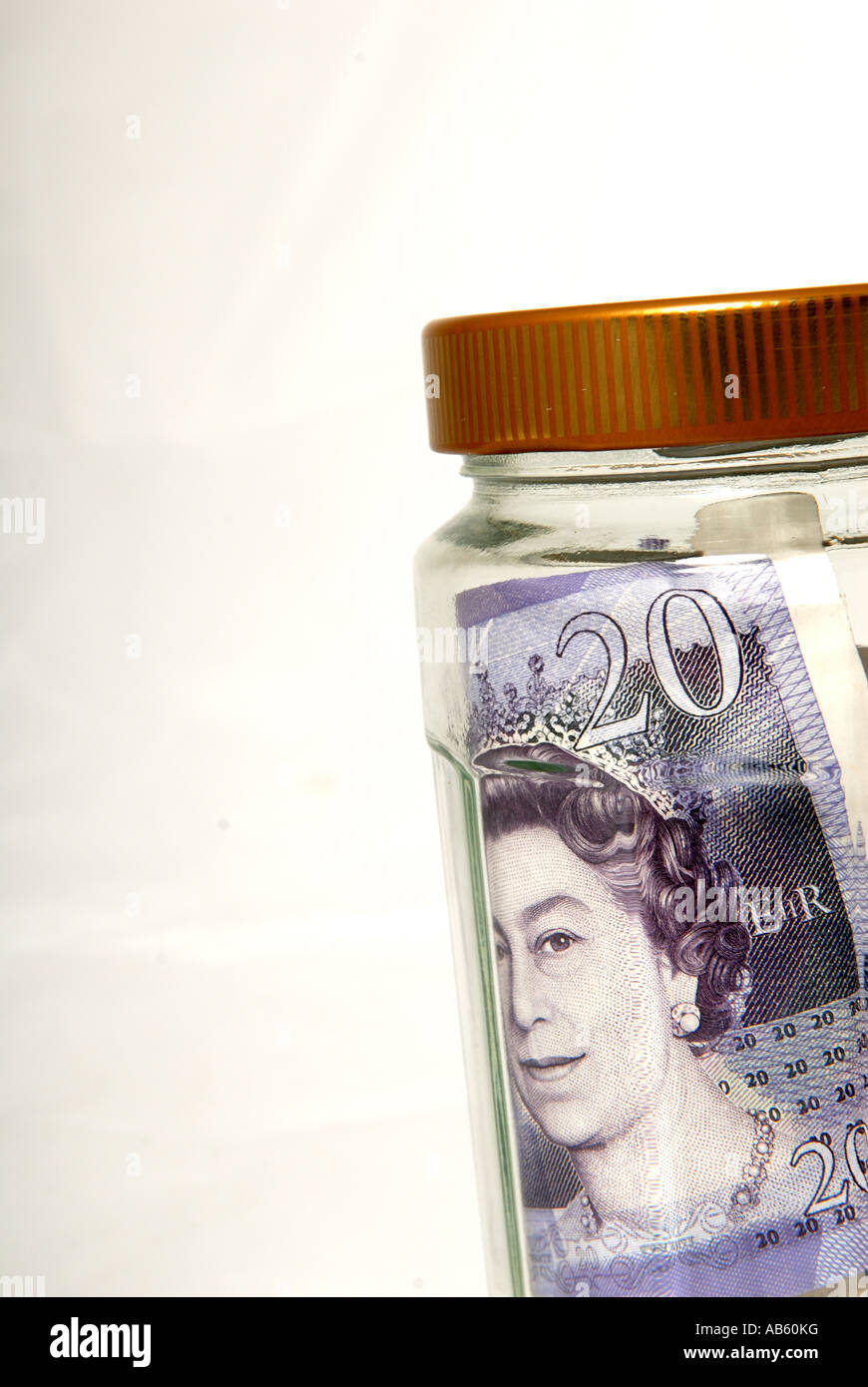 Money in jar Stock Photo - Alamy