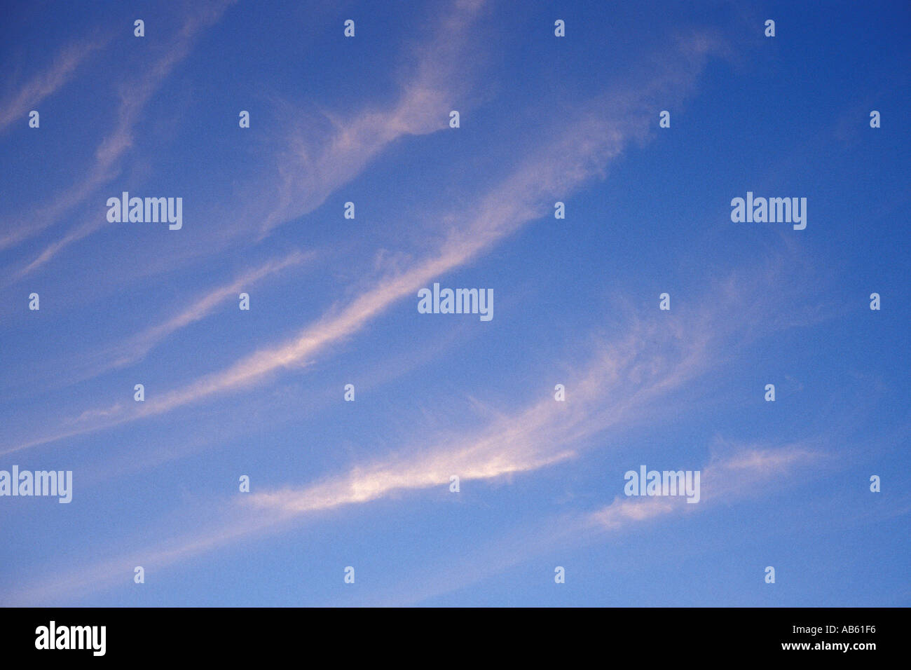 Cirrus clouds at sunset Stock Photo - Alamy