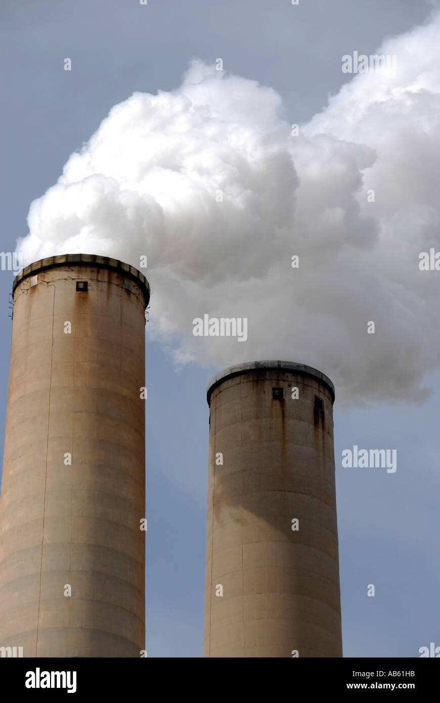 Steam is vented from the stacks of a Michigan electric power station ...