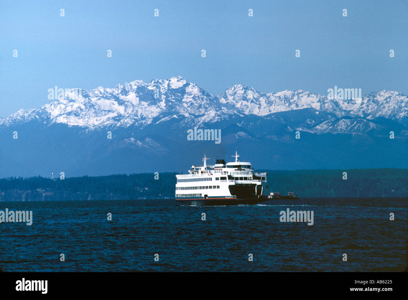 Washington State Ferry on Puget Sound with snow capped Olympic ...