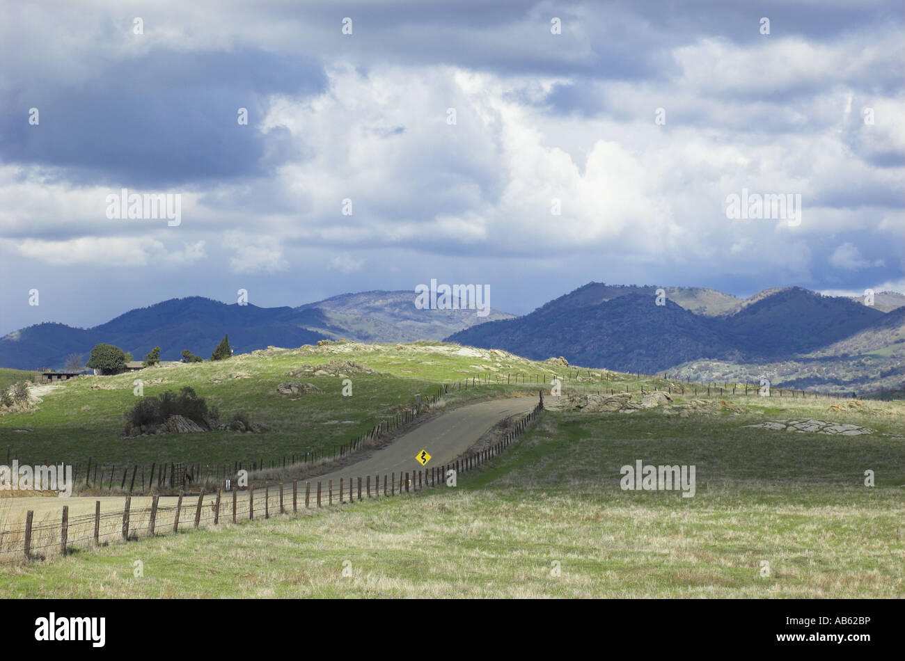 Two lane road in the foothills of the Sierra Nevada Mountains in the ...