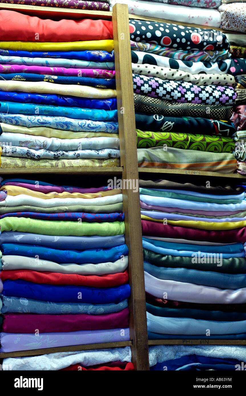 Stacked cloth ready for use, Hoi An market Stock Photo - Alamy