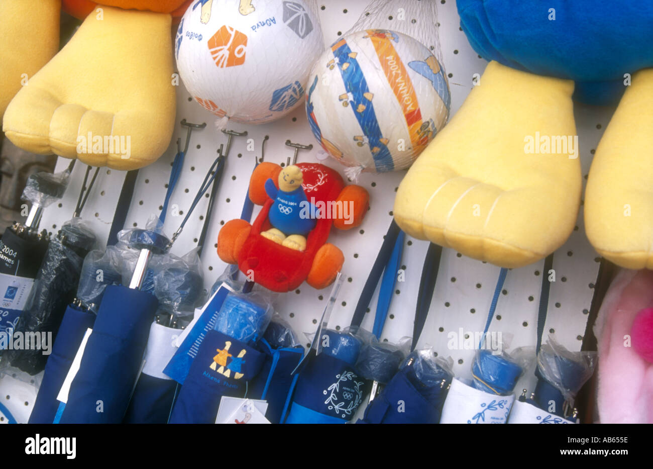 Phevos, an Olympic mascot, with balls umbrellas and other official ...