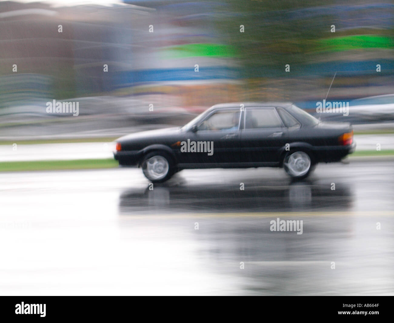 Car driving on street hi-res stock photography and images - Alamy