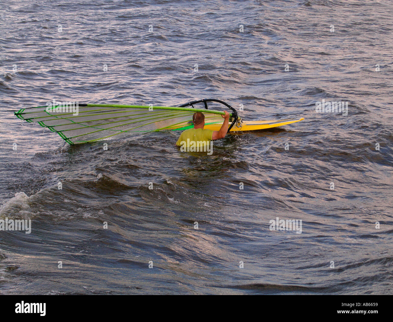 wind surfer in water Stock Photo - Alamy
