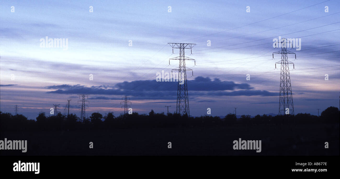 Electricity pylons at dusk Gloucestershire England UK Europe Stock ...