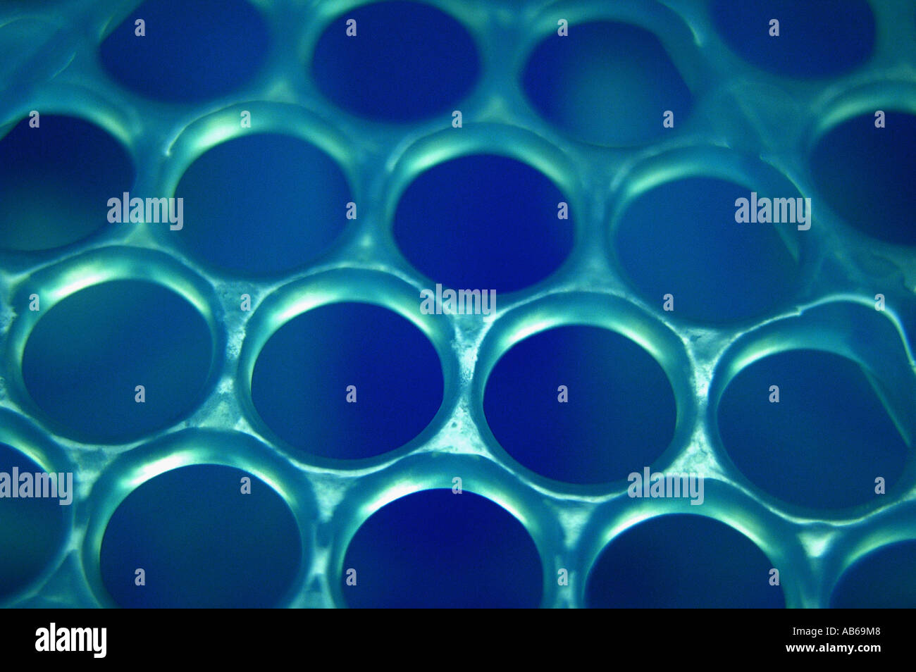 Blue plastic holes Stock Photo - Alamy