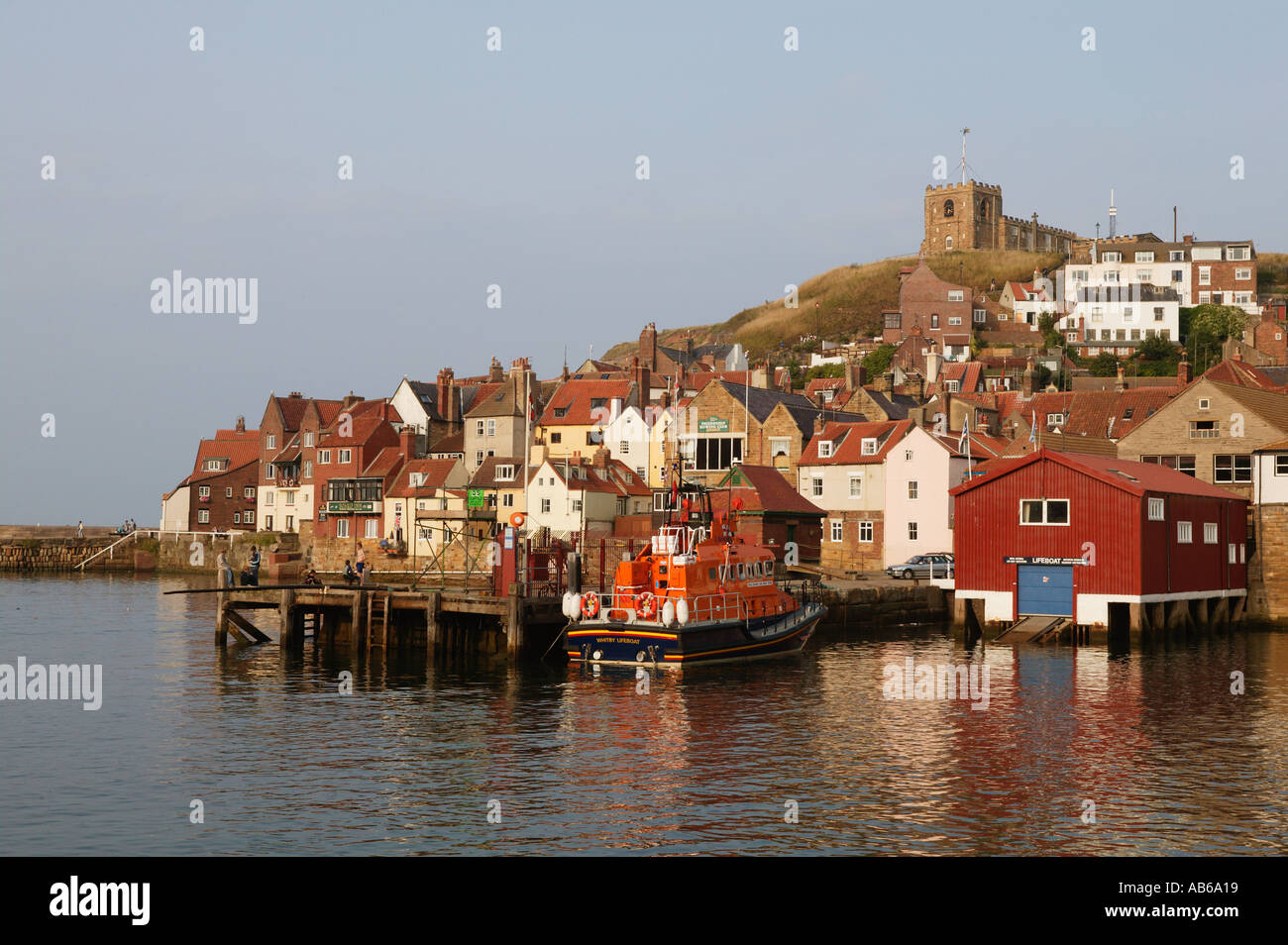 WHITBY HARBOUR OLD SIDE WITH LIFE BOAT AND SAINT MARYS CHURCH Stock ...