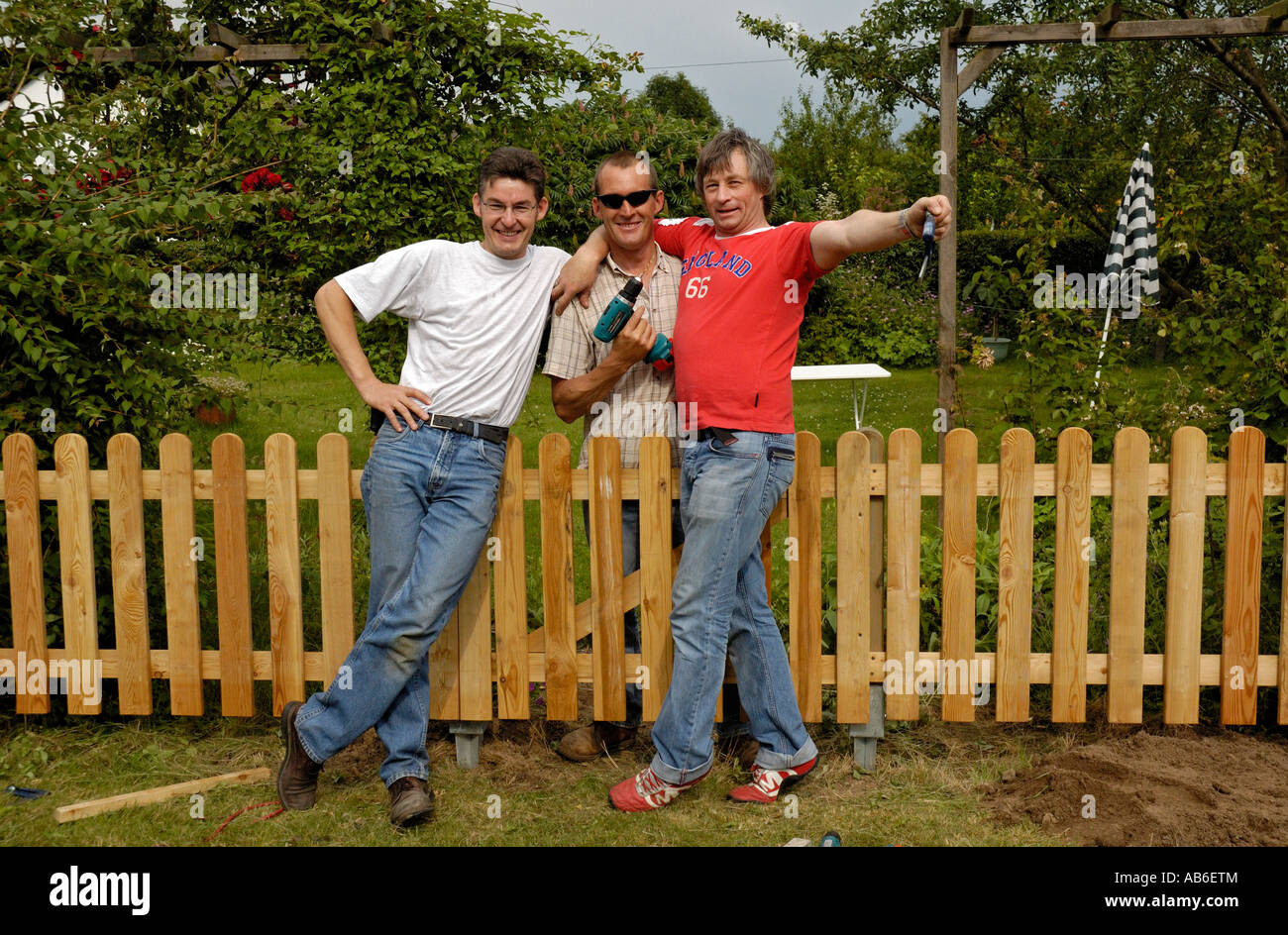 Handymen have just finished building a garden fence on allotments in ...