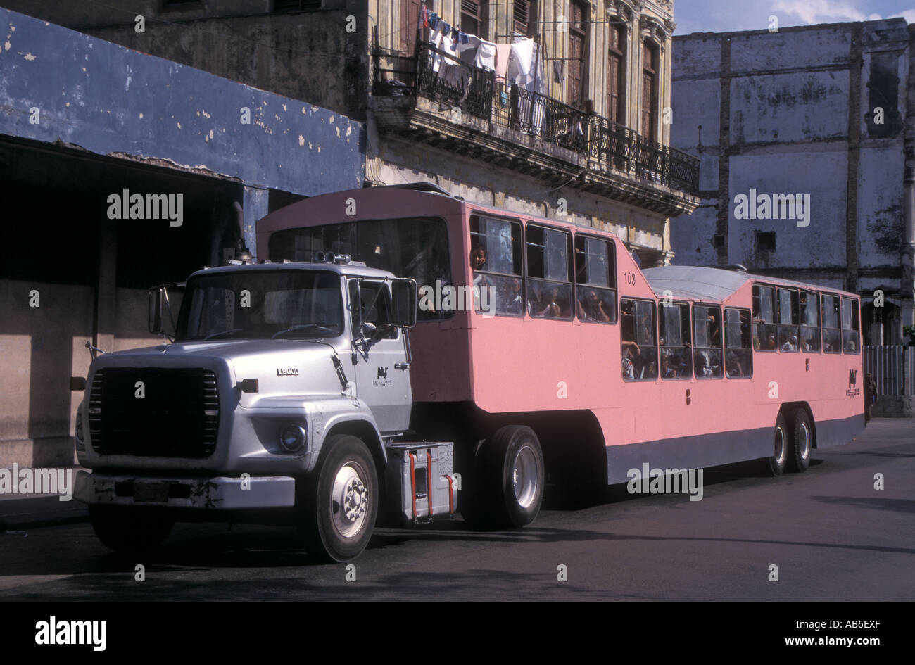 Cuba's unique pink Camel Bus (note the hump) full of passengers Stock ...