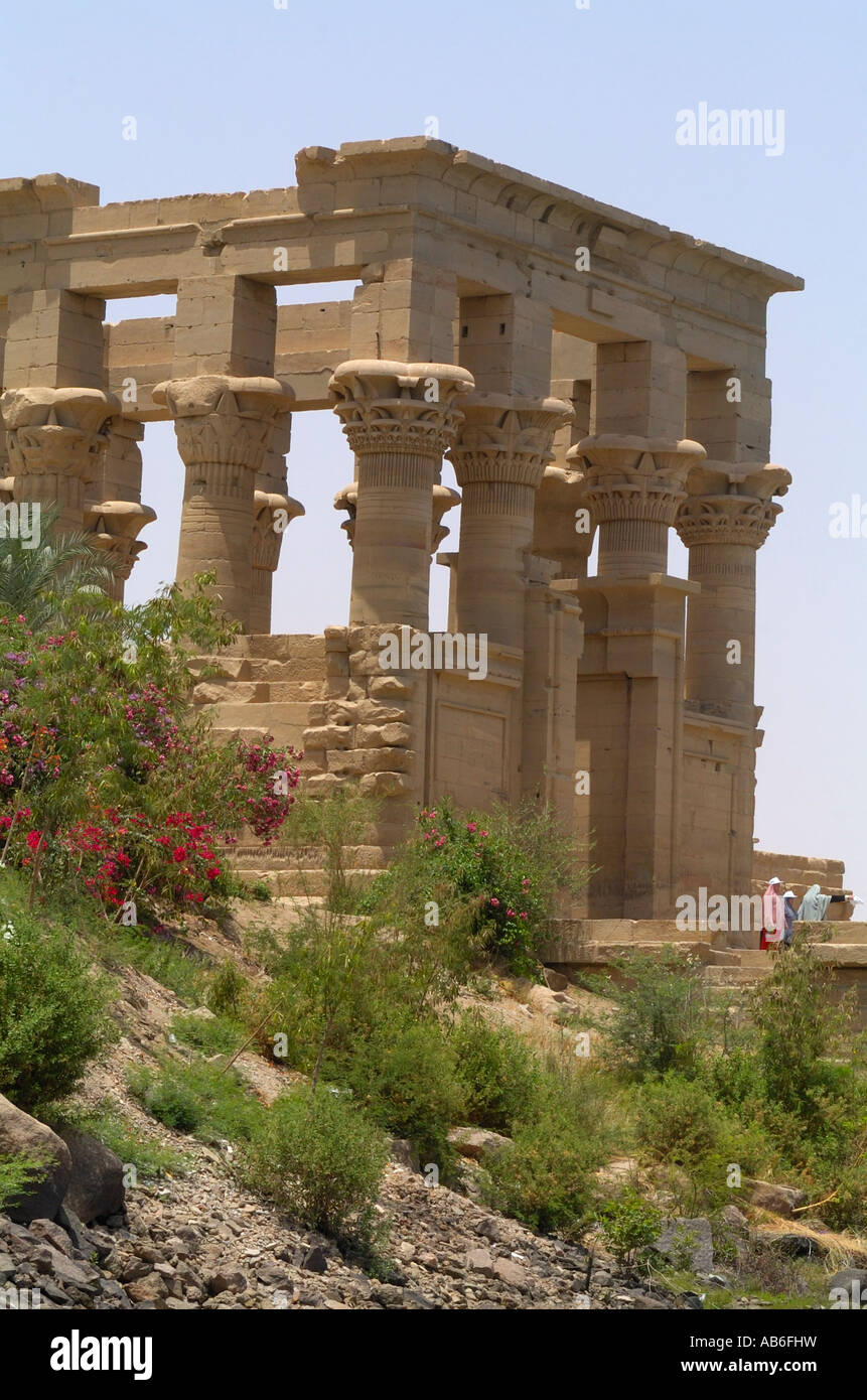 Visitors admire the architecture at Trajan's Kiosk at Philae Temple ...