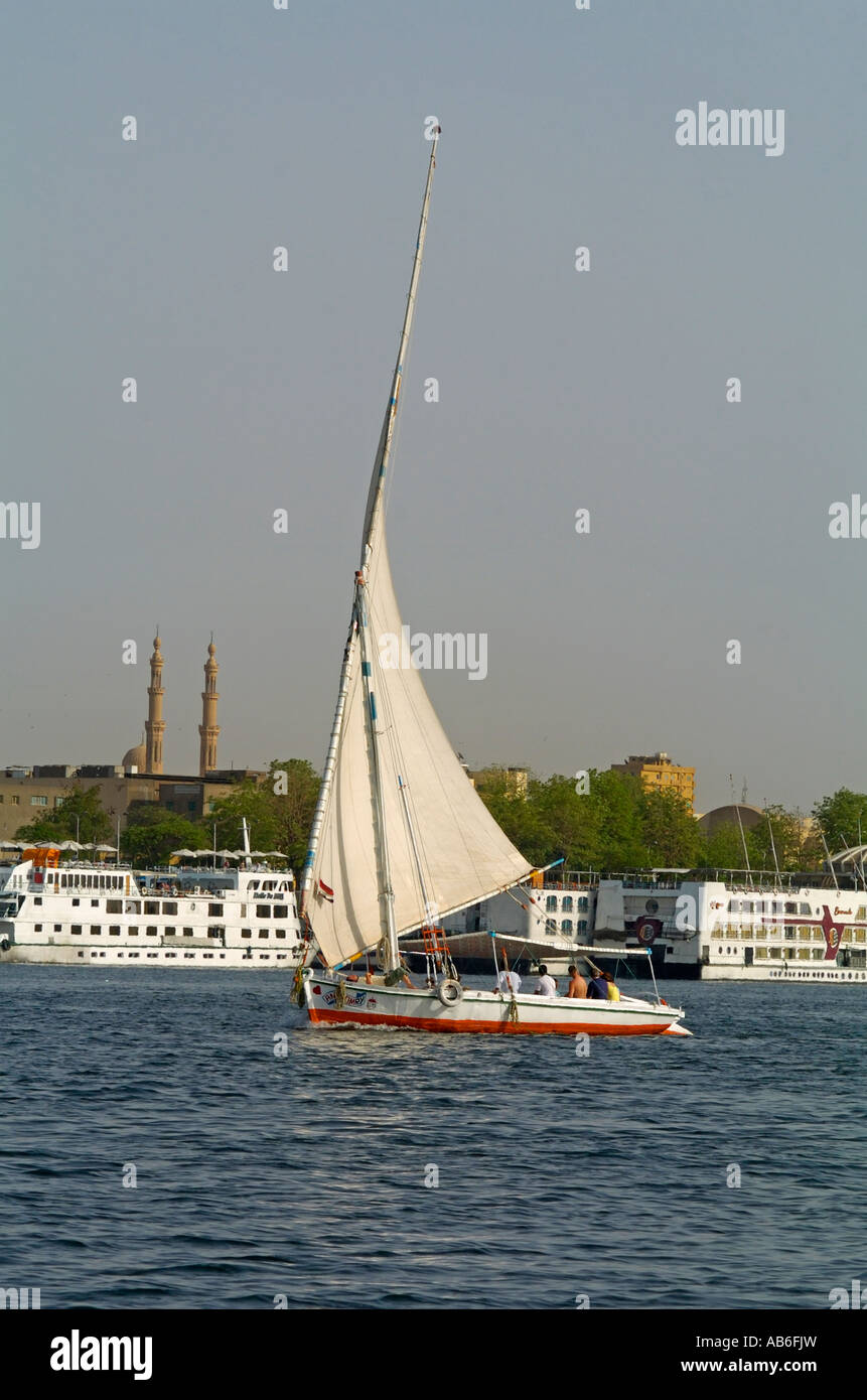 A Felucca, a traditional wooden sailing boats on the River Nile Aswan ...
