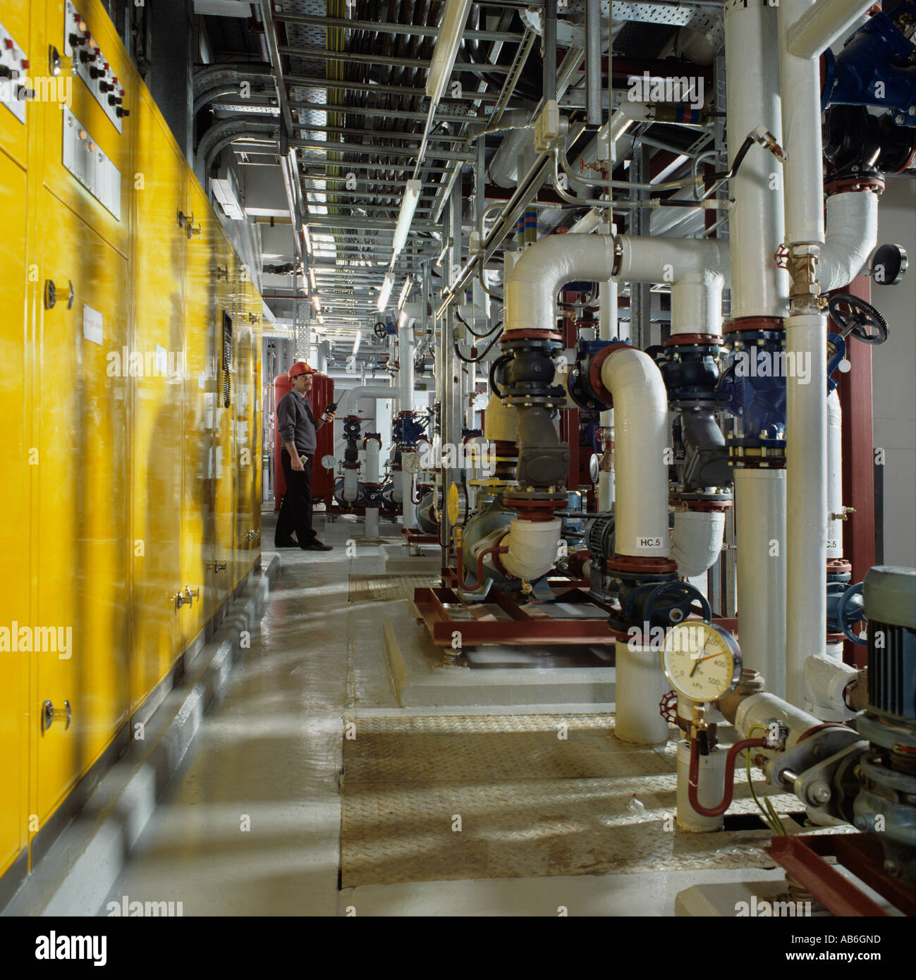 Office block plant room showing pipework for boilers and air ...