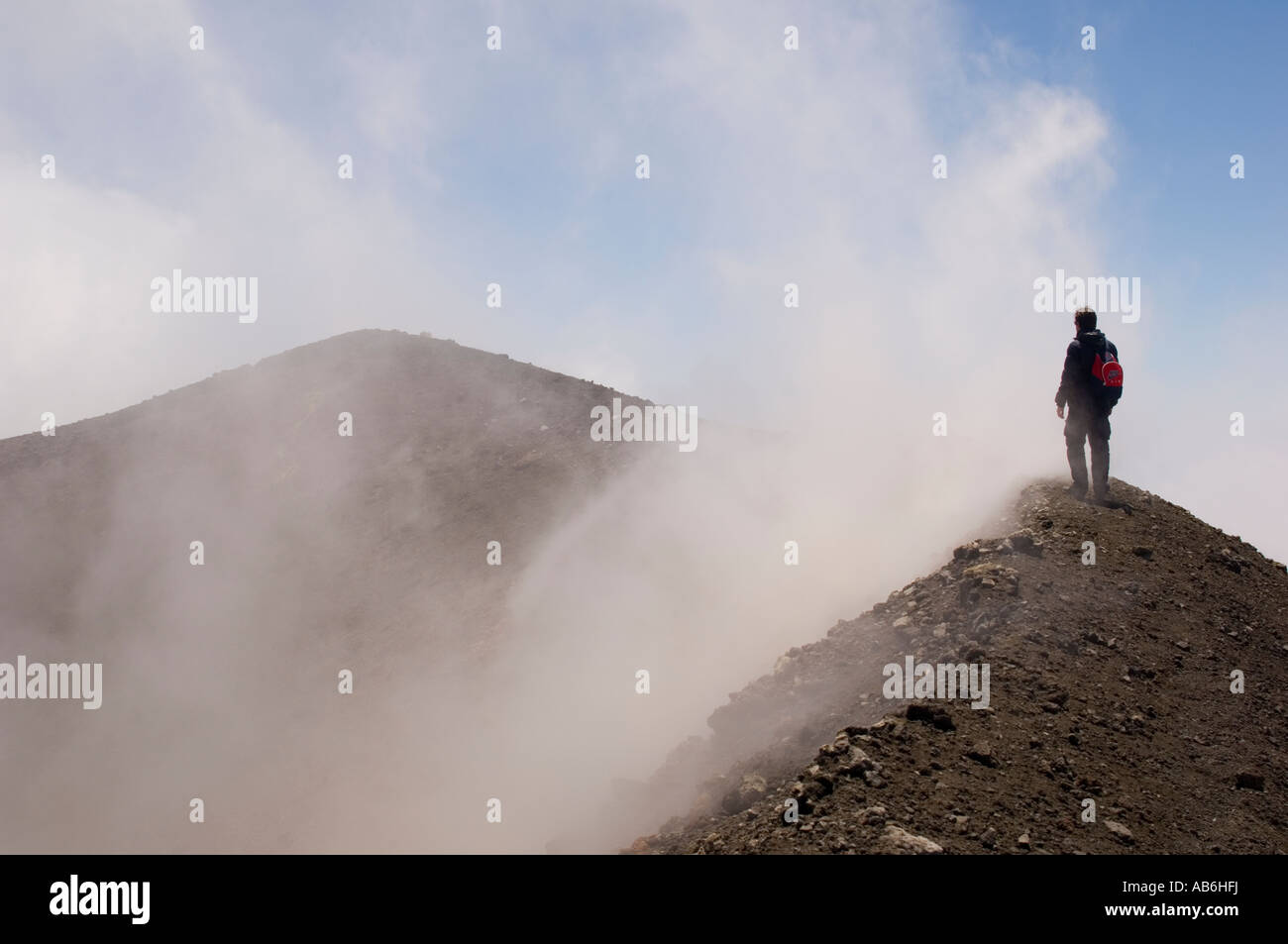 tourist visiting etna volcano Stock Photo - Alamy