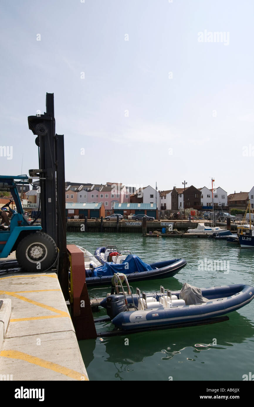 Lowering boats hi-res stock photography and images - Alamy
