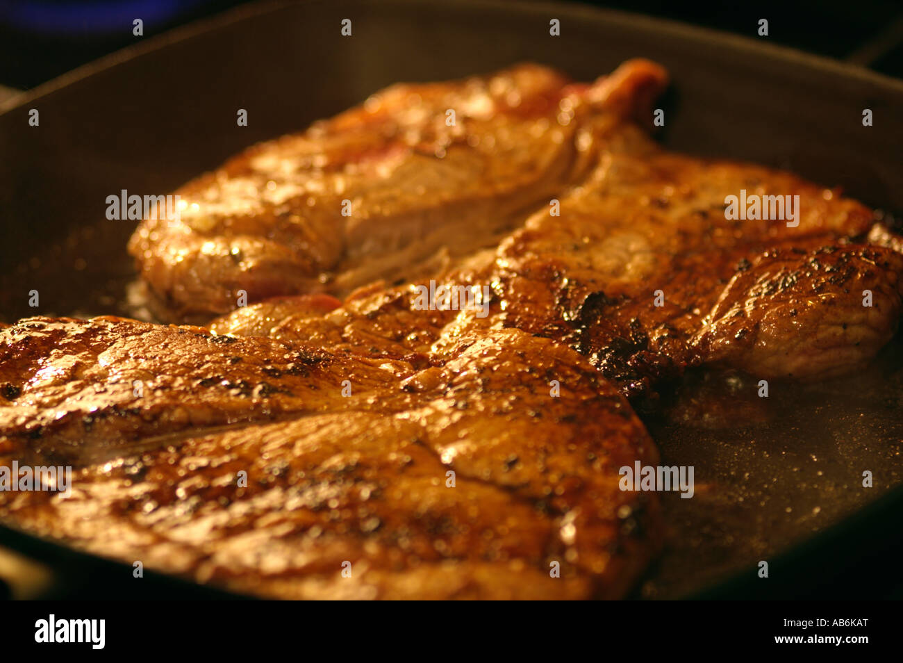 Rump Steak being cooked in a Skillet Stock Photo - Alamy