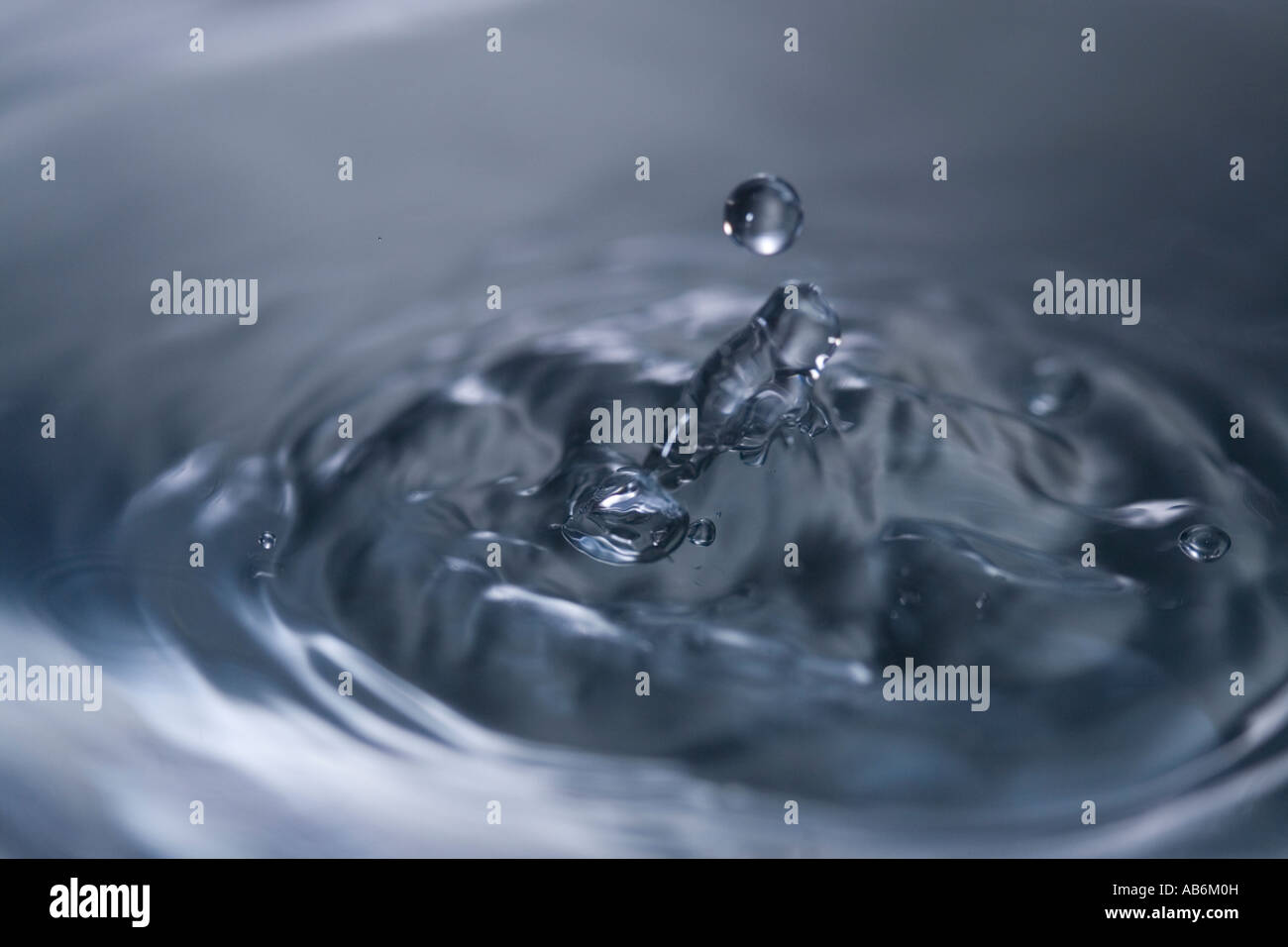 Falling water droplet Stock Photo - Alamy