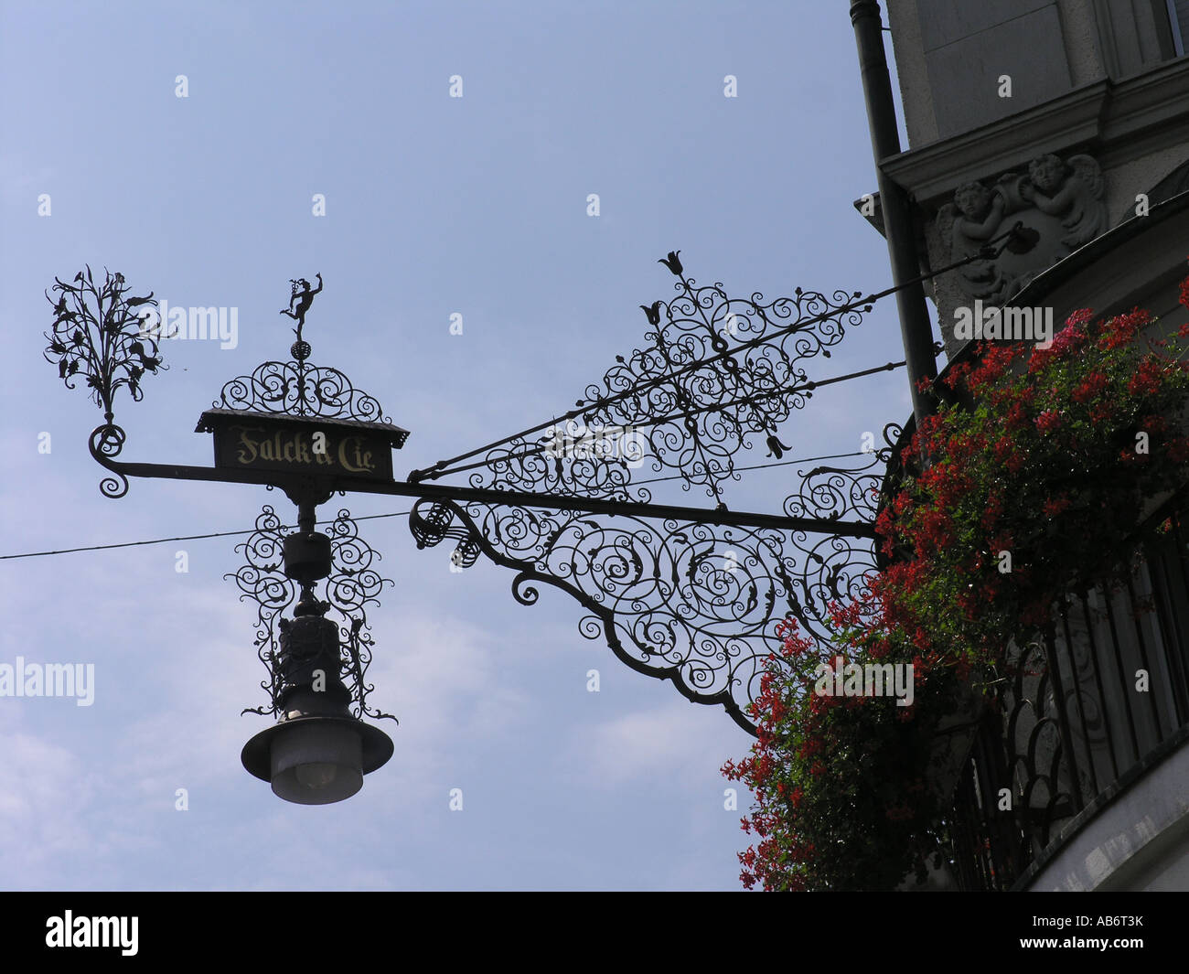 Wrought-iron shop sign and Lantern Lucerne Switzerland Stock Photo - Alamy