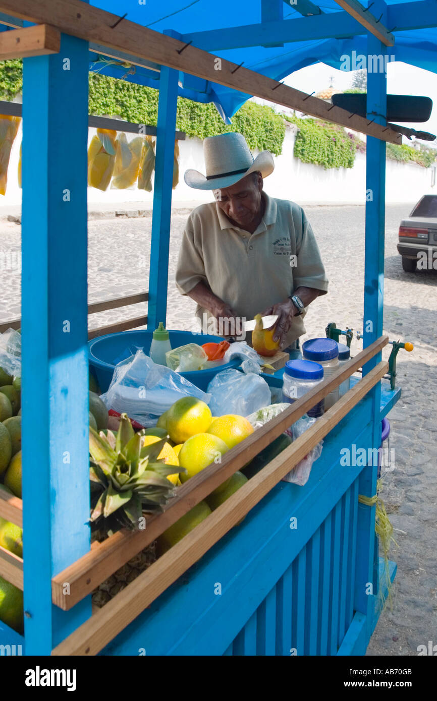 Street vendor selling Mango Antigua Guatemala Stock Photo - Alamy
