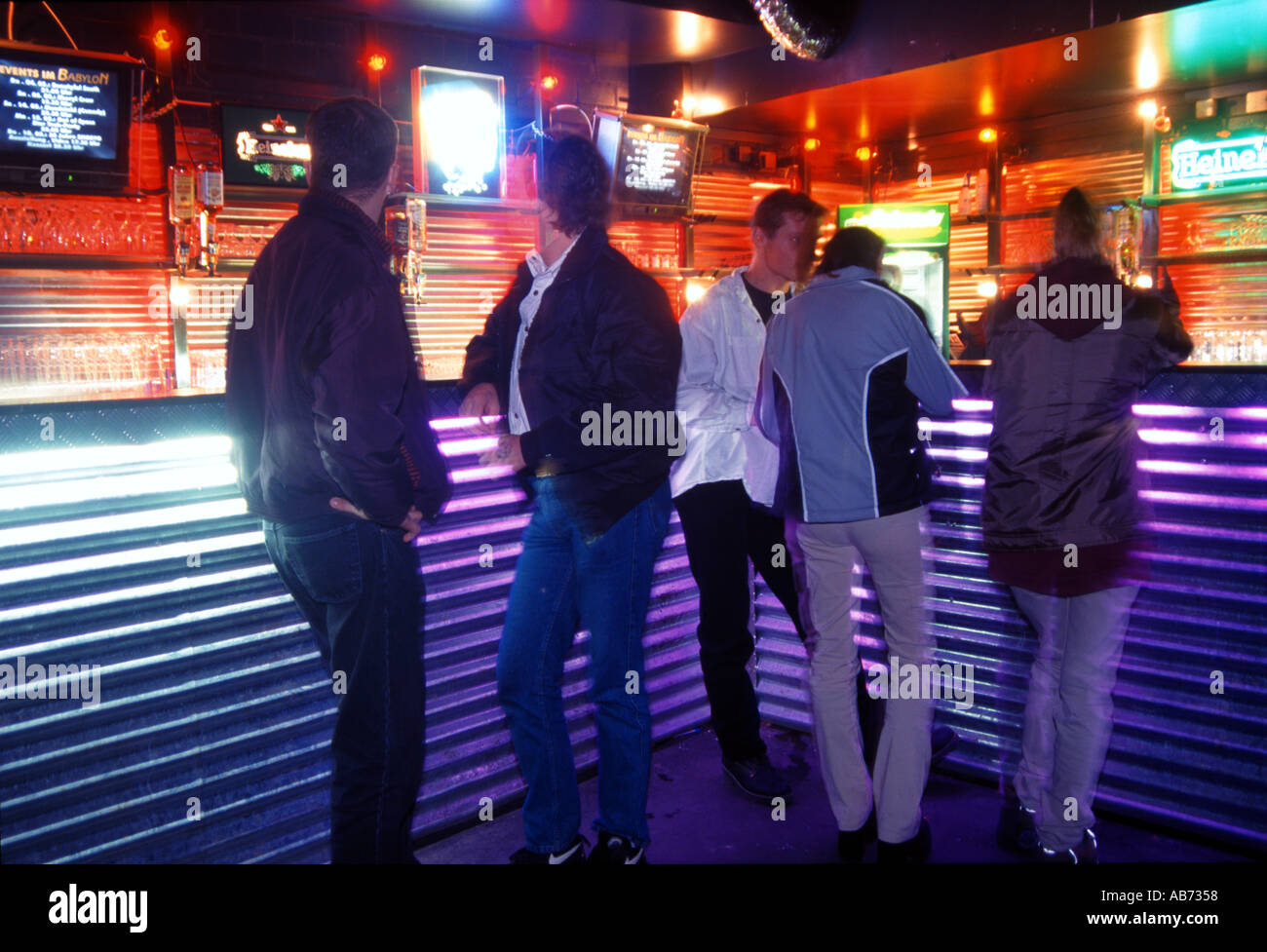 Babylon Disco Bar visitors customers standing drinking at the bar table ...