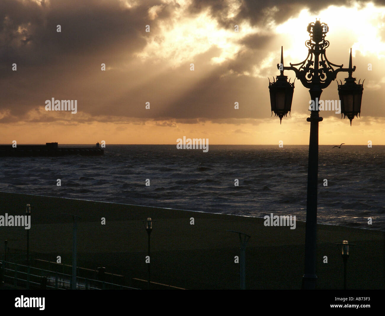 Brighton sky with lamp Stock Photo - Alamy