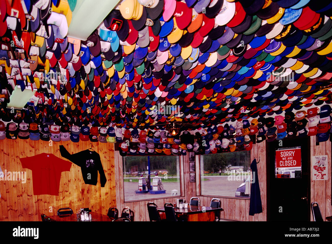 A Collection of Baseball Caps mounted to the Ceiling in a Cafe in Toad ...
