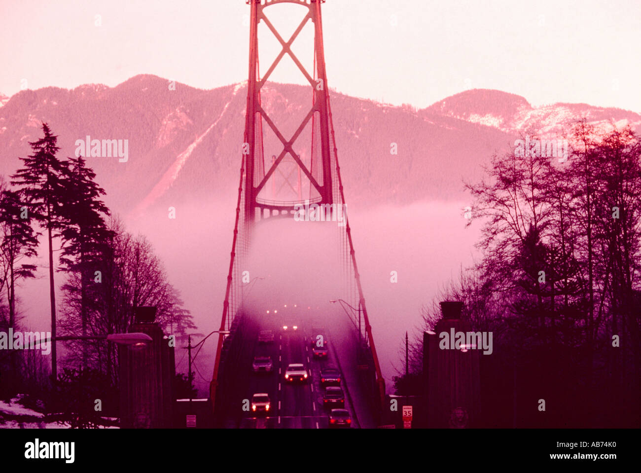 The Lions Gate Bridge over the First Narrows of Burrard Inlet in Fog in ...