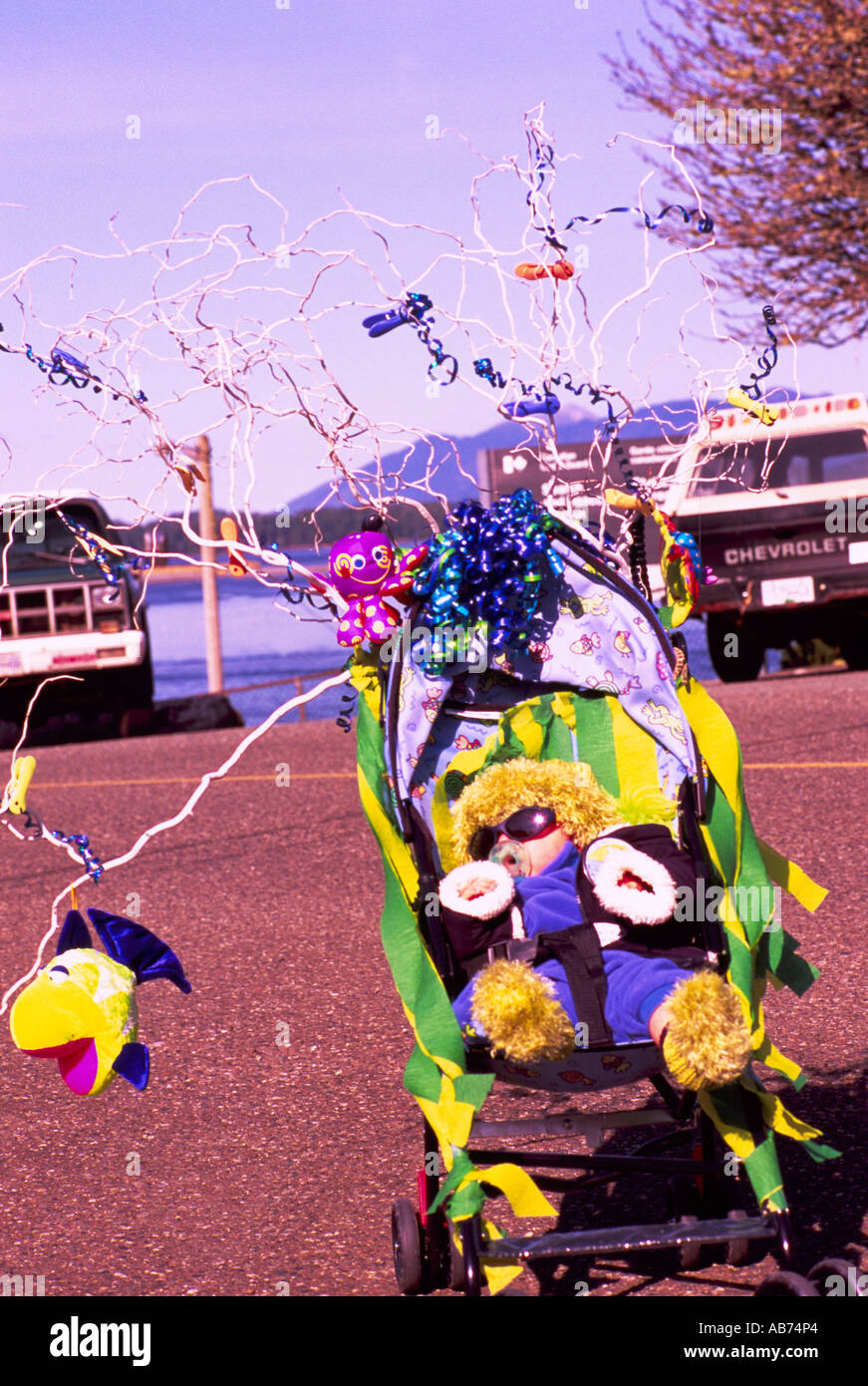 Baby sleeping in Stroller decorated for Parade at Pacific Rim Whale ...