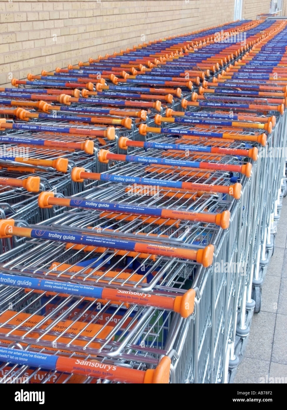 Shopping trolleys outside sainsburys supermarket hi-res stock ...