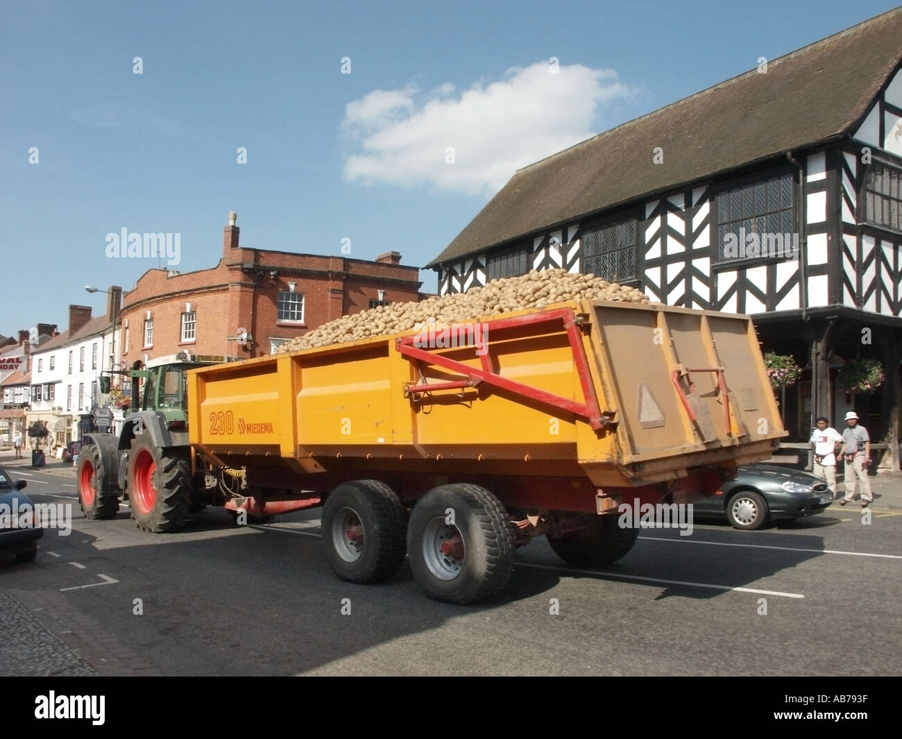 Ledbury Hereford Herefordshire bright yellow trailer loaded with ...