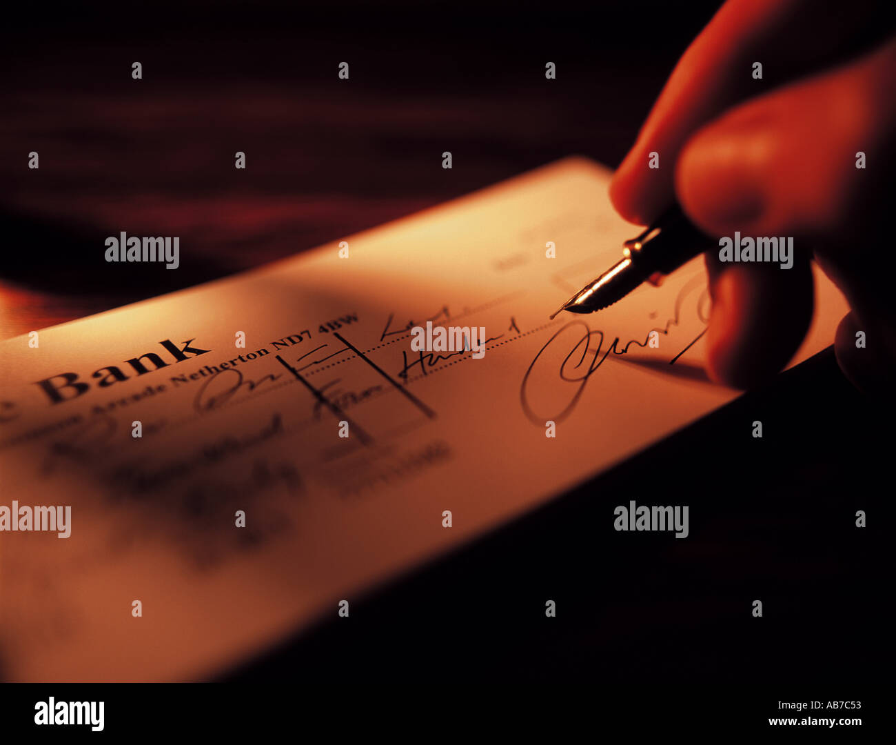 Hand writing cheque hi-res stock photography and images - Alamy