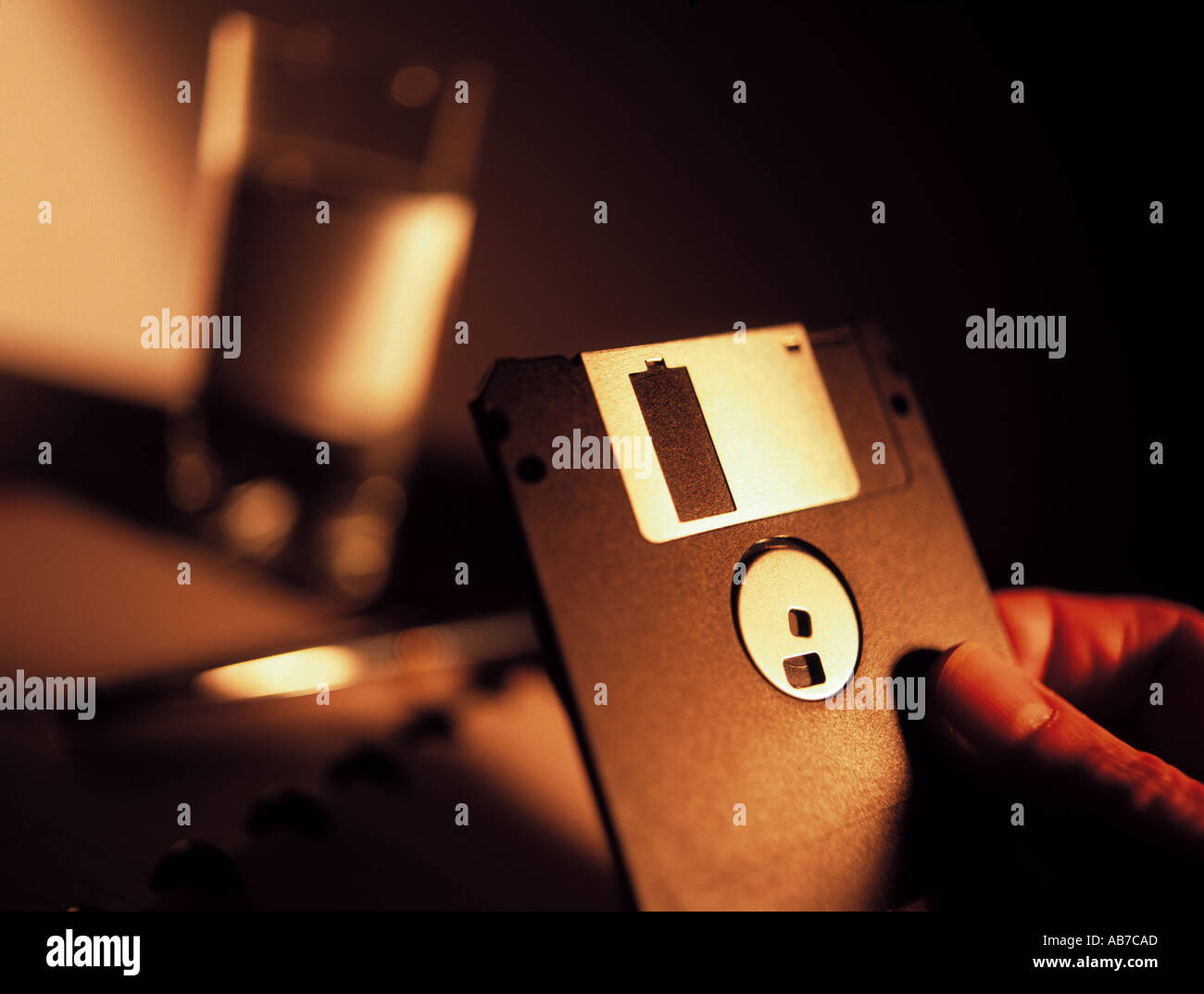 Hand holding floppy disk hi-res stock photography and images - Alamy
