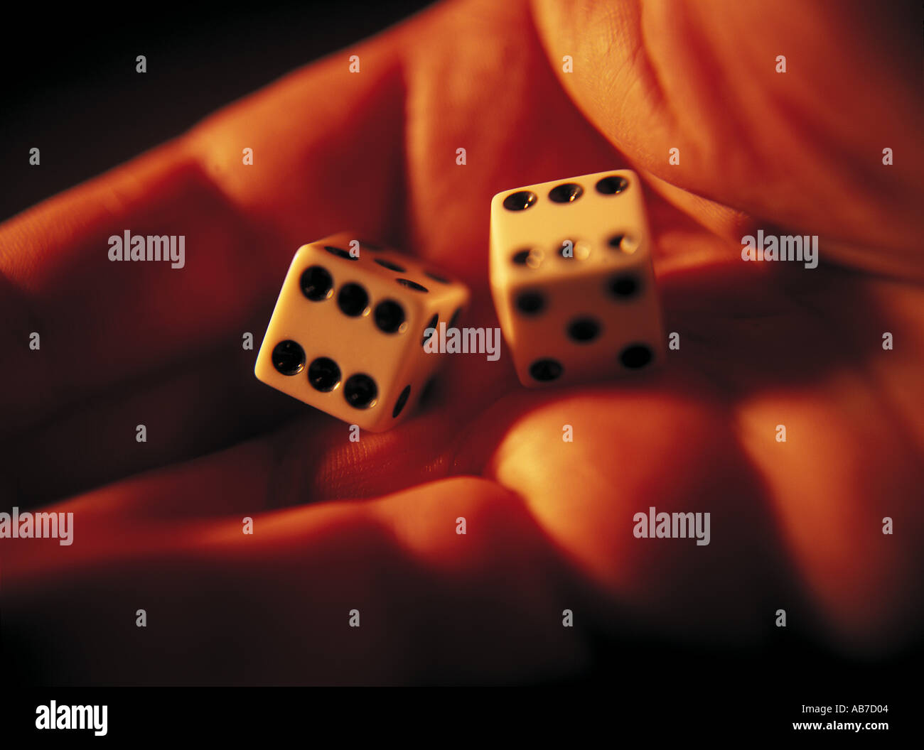 Man holding one dice hi-res stock photography and images - Alamy